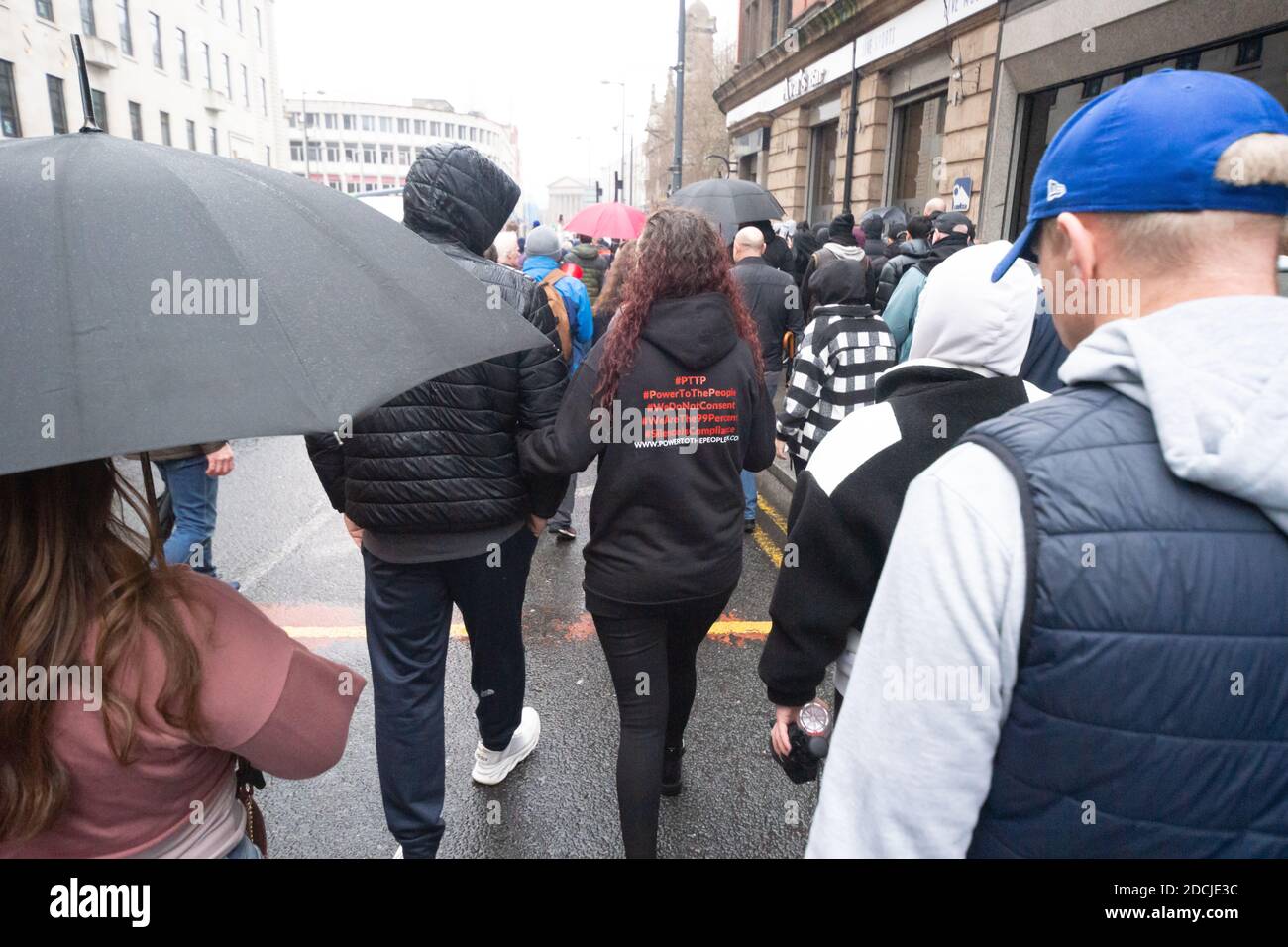 Liverpool city centre, 21st Nov 2020: Woman wearing power to the people ...