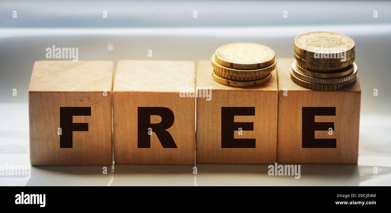 FREE word made with wooden blocks. Business promotion concept Stock ...
