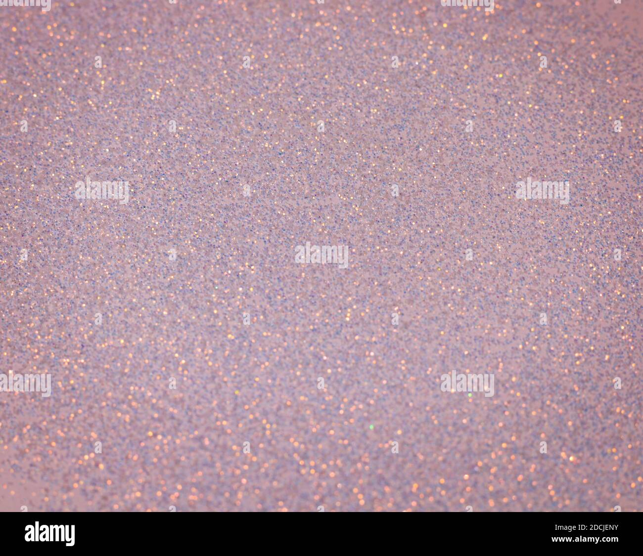 A closeup shot of beautiful purple sprinkles for wallpaper or ...