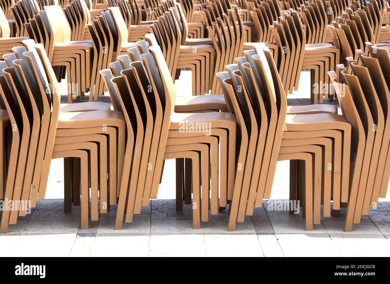 Stack of chairs in meeting room Stock Photo - Alamy