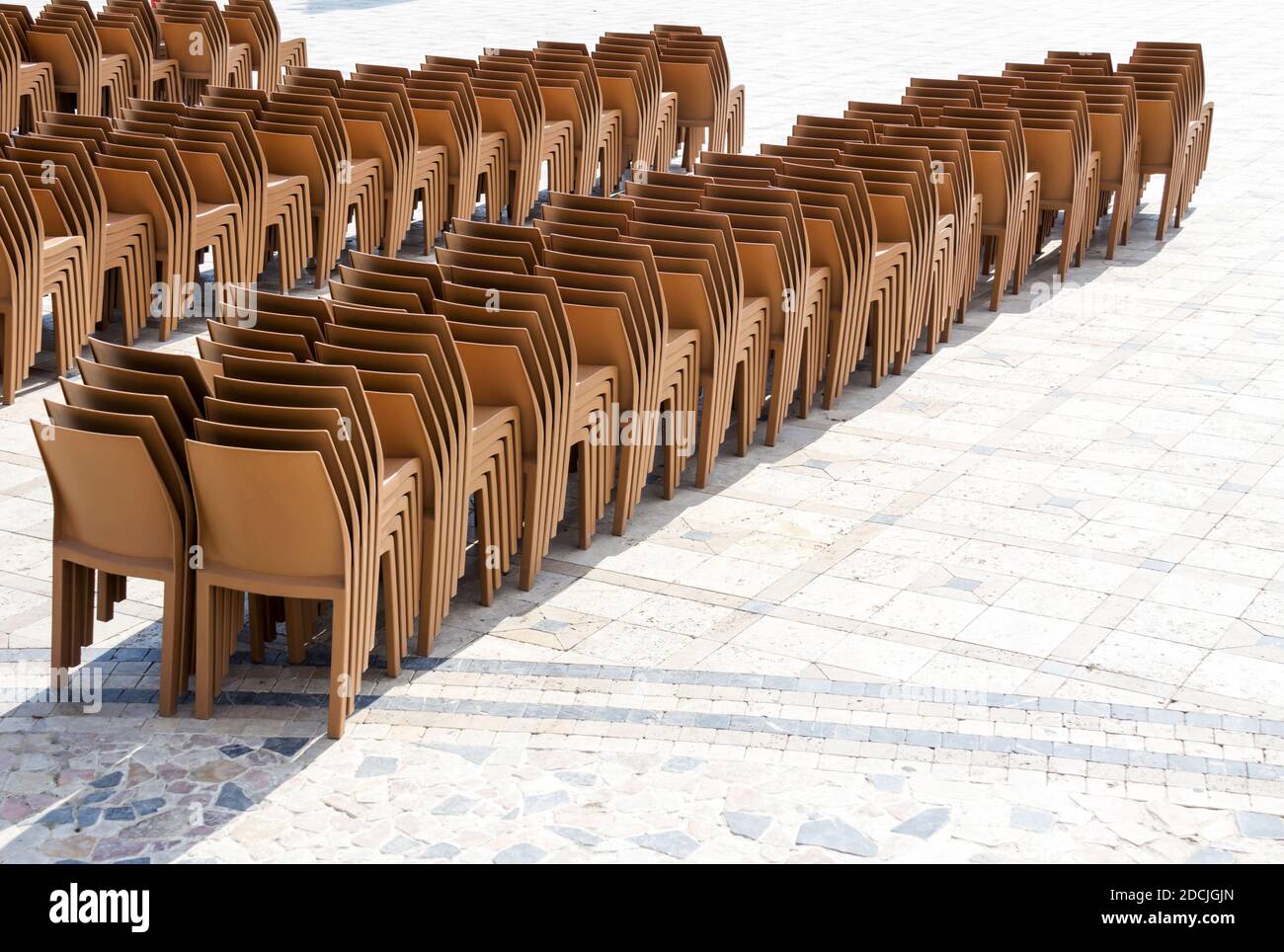 Stack of chairs in meeting room Stock Photo - Alamy