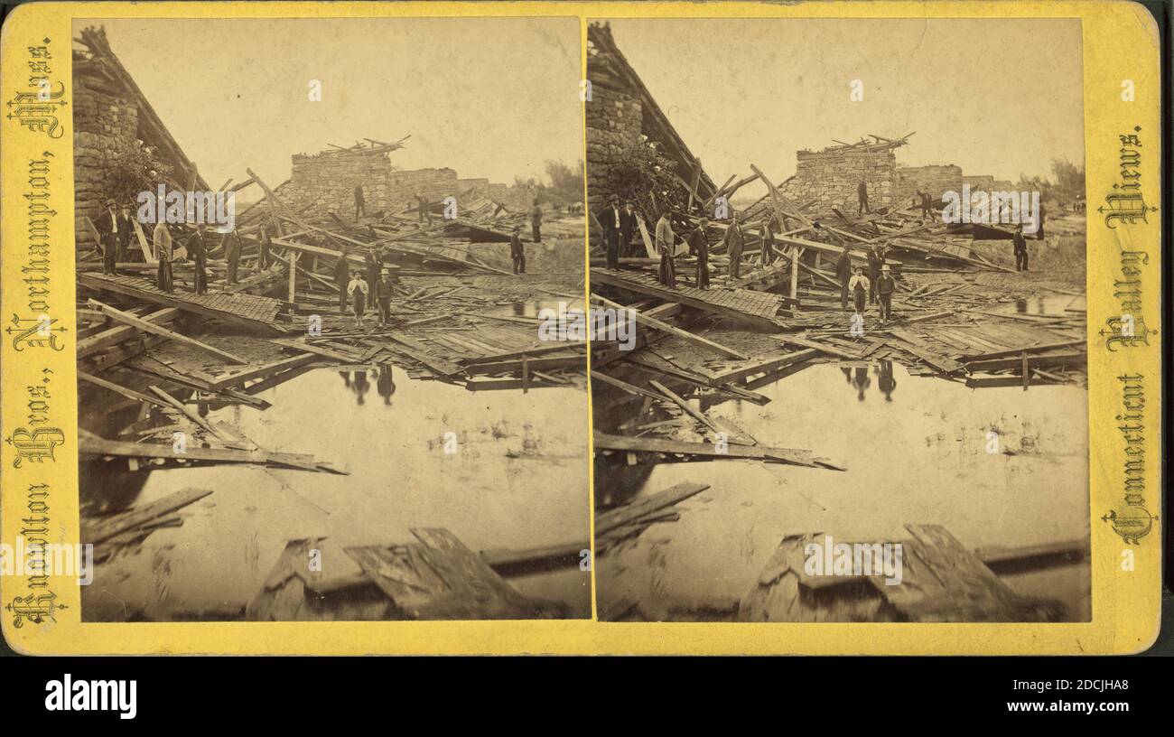 Debris piled around bulkheads of a bridge apparently destroyed in a ...