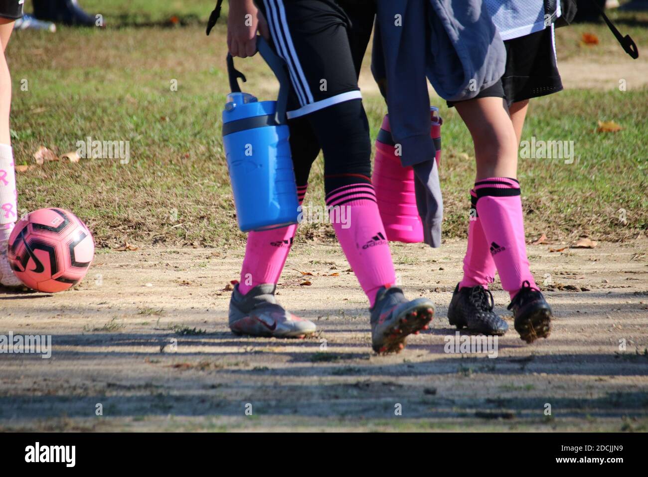 Girls playing soccer in field hi-res stock photography and images - Alamy