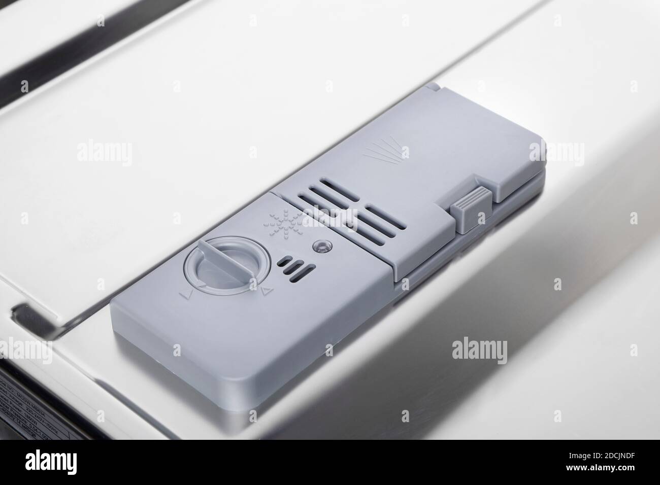 Dishwasher detergent powder tank with steel base Stock Photo - Alamy