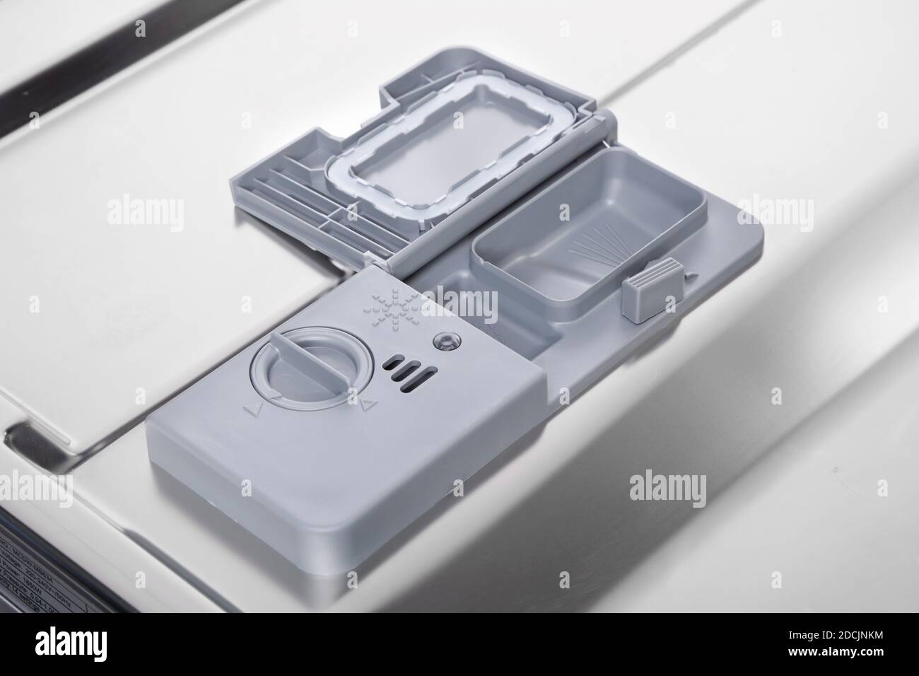 Dishwasher detergent powder tank with steel base Stock Photo - Alamy