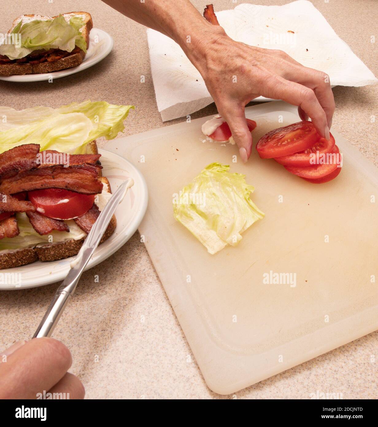 making a BLT (bacon lettuce & tomato) sandwich Stock Photo - Alamy
