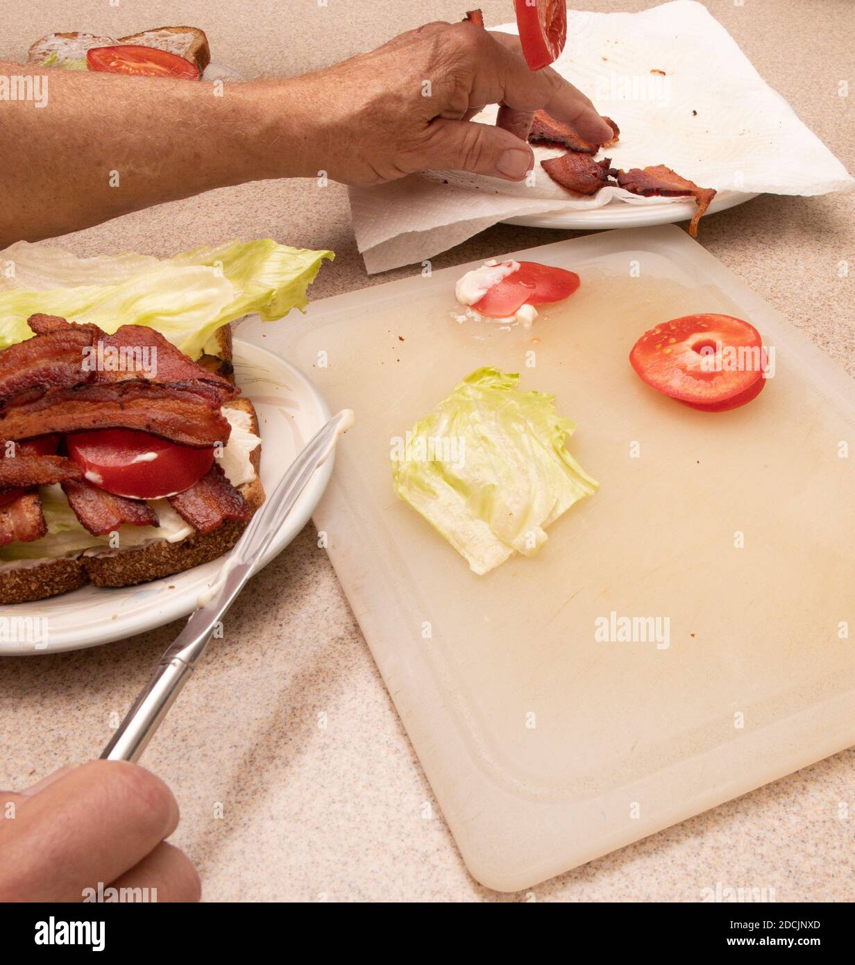 making a BLT (bacon lettuce & tomato) sandwich Stock Photo - Alamy