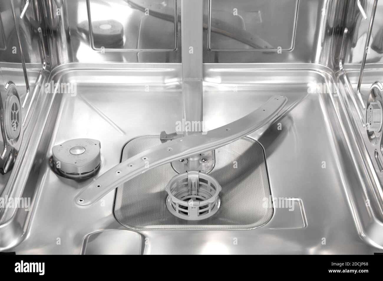 Inside the stainless steel dishwasher Stock Photo - Alamy