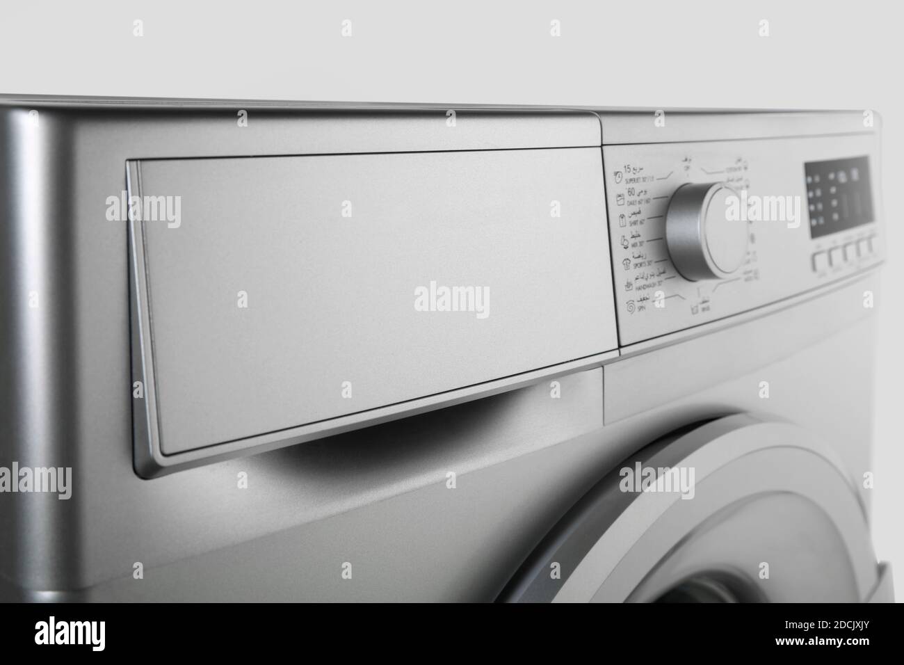 Details of digital display and washing machine volume on white ...