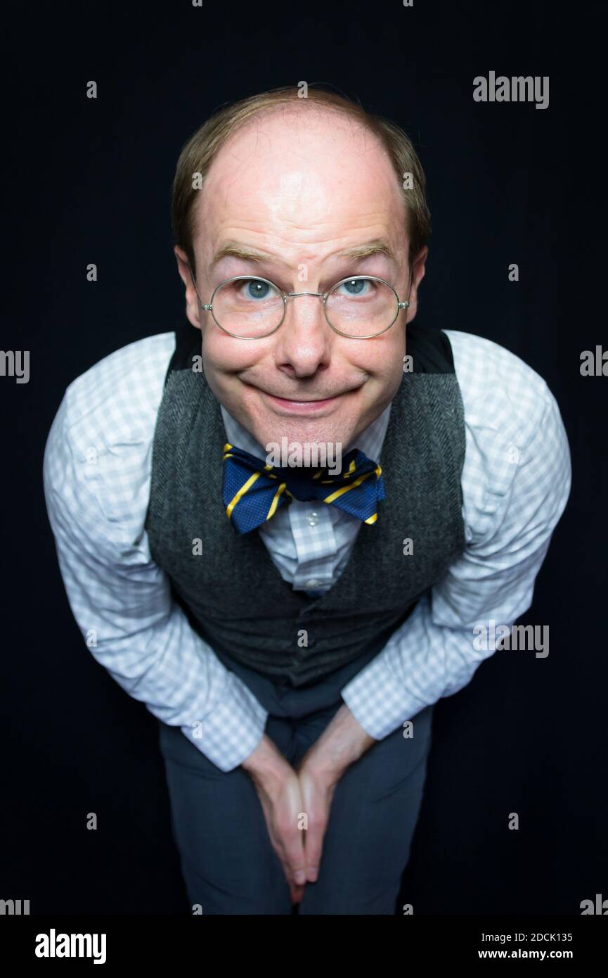 Portrait of Man in Tweed Waistcoat and Bow Tie Smiling Sweetly Stock ...