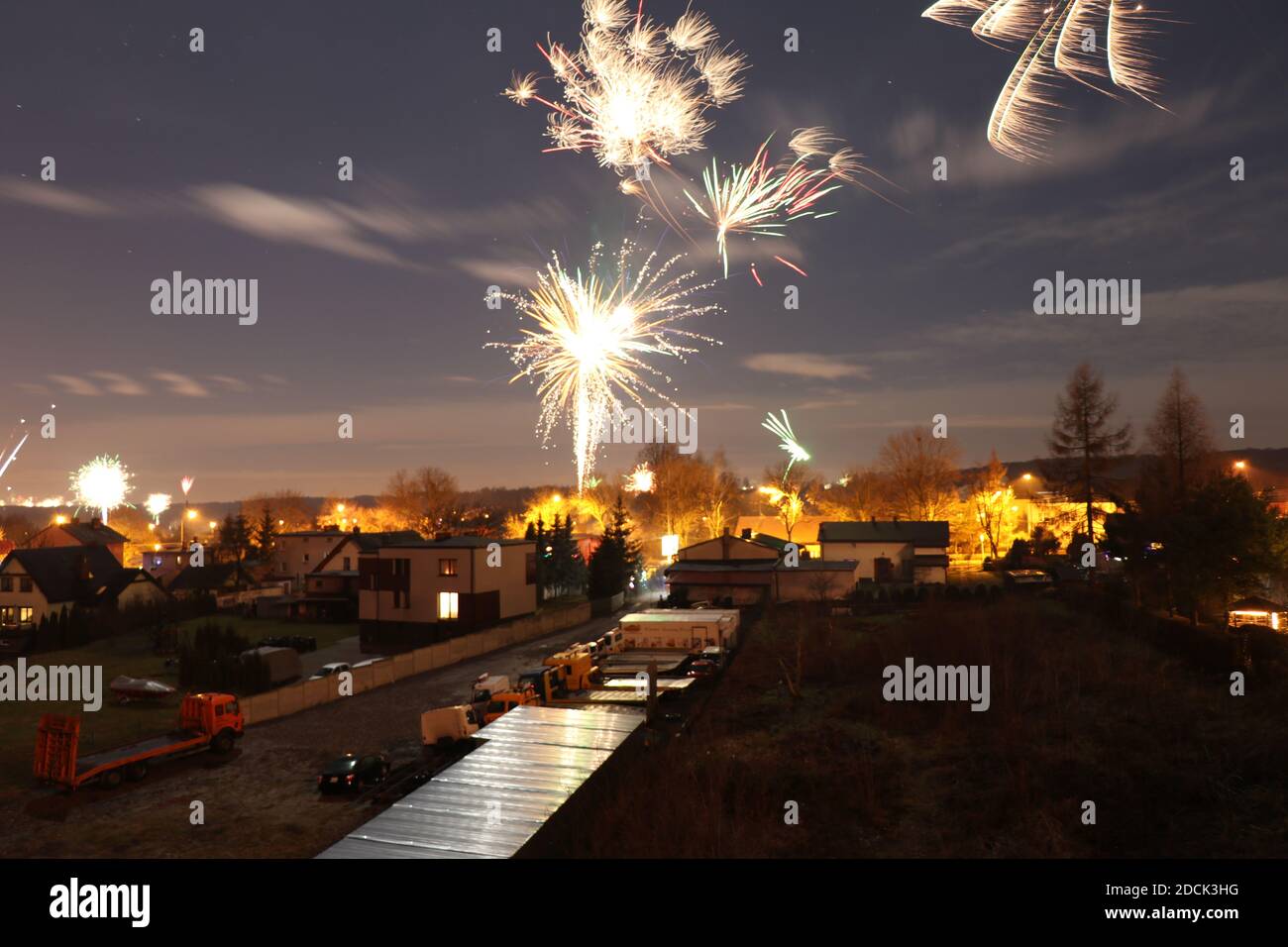 View of an panorama of exploding fireworks over a city in New Year ...