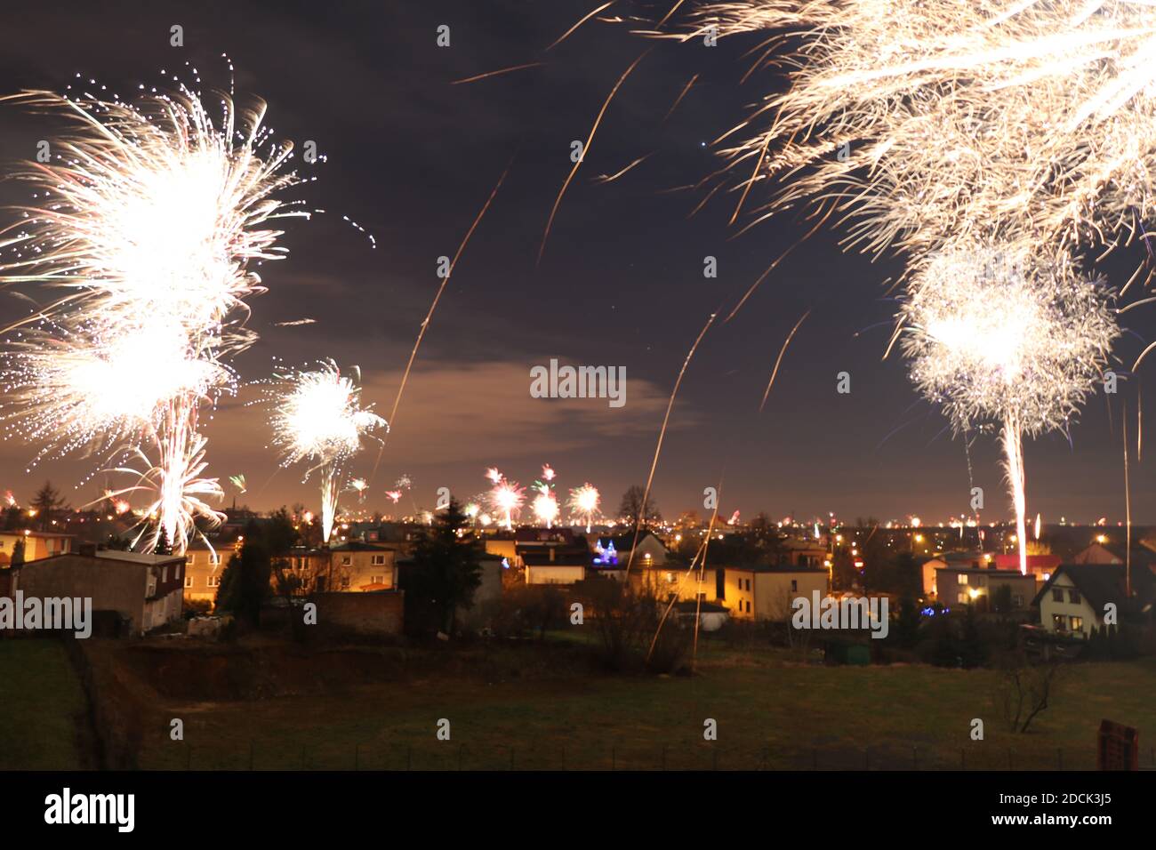 View of an panorama of exploding fireworks over a city in New Year ...