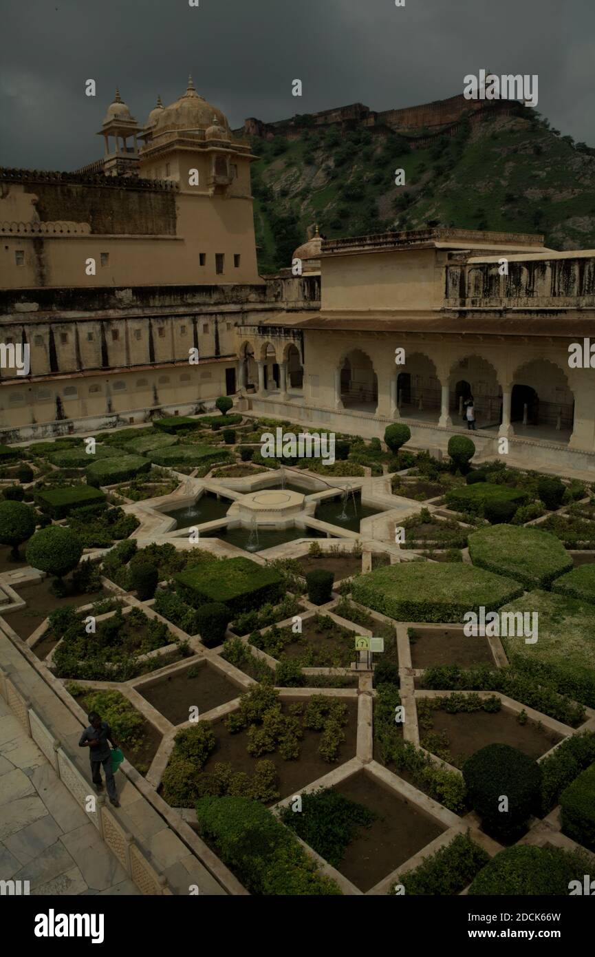 Garden in Amer Fort complex with a part of Jaigarh Fort located on ...