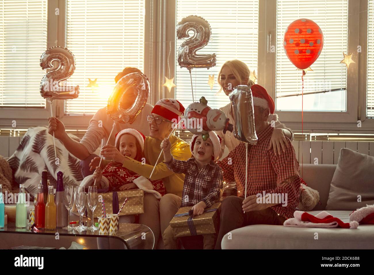 Family celebrating new year hi-res stock photography and images - Alamy