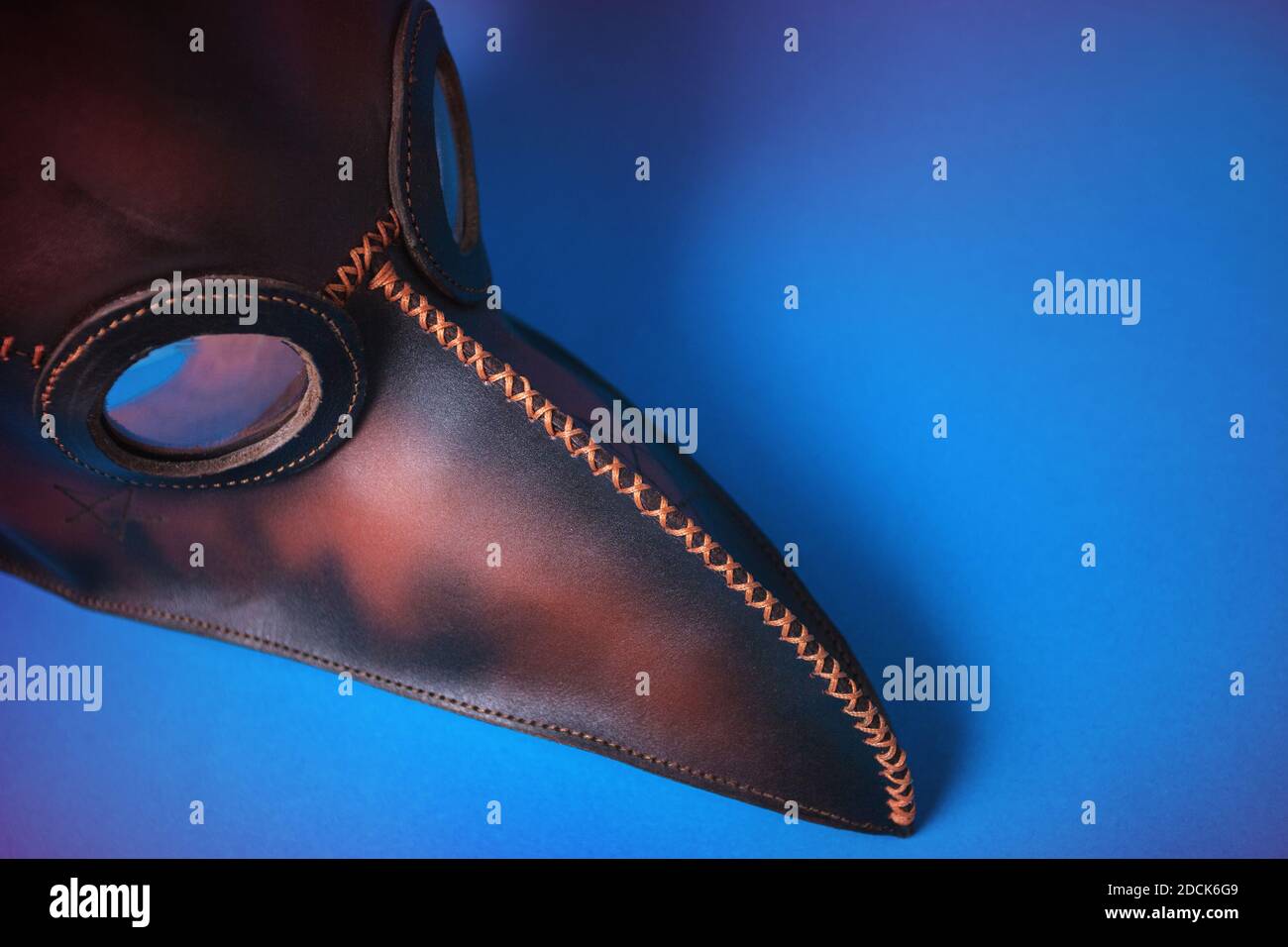 Plague doctor mask isolated on a blue background. medical face shield ...