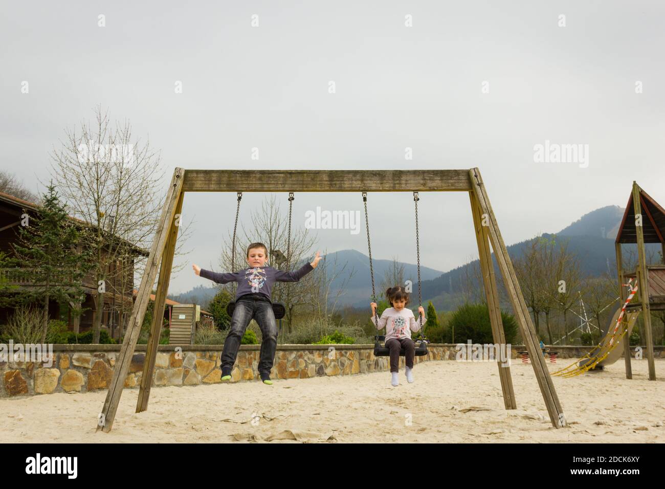 Kids Jumping Out Of Swings