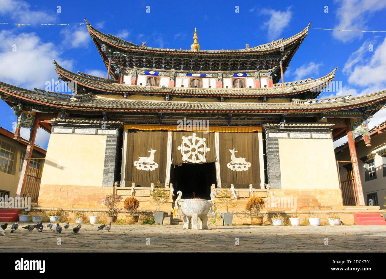 A Traditional Tibetan monastery building in the old town of Dukezong ...