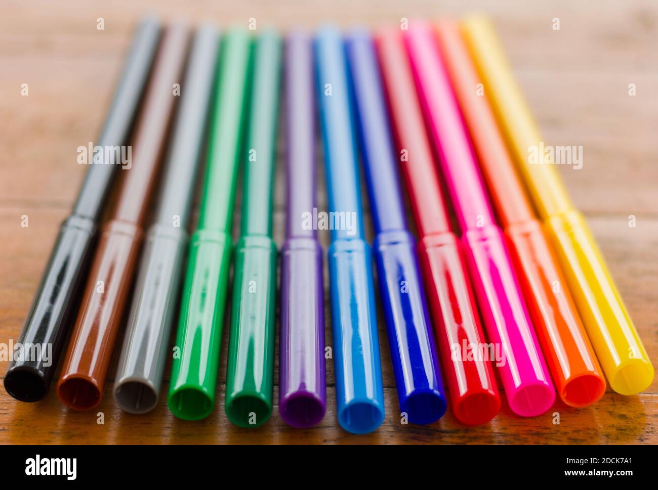 Close up on twelve color pens lined up ready to be used. Colorful ...