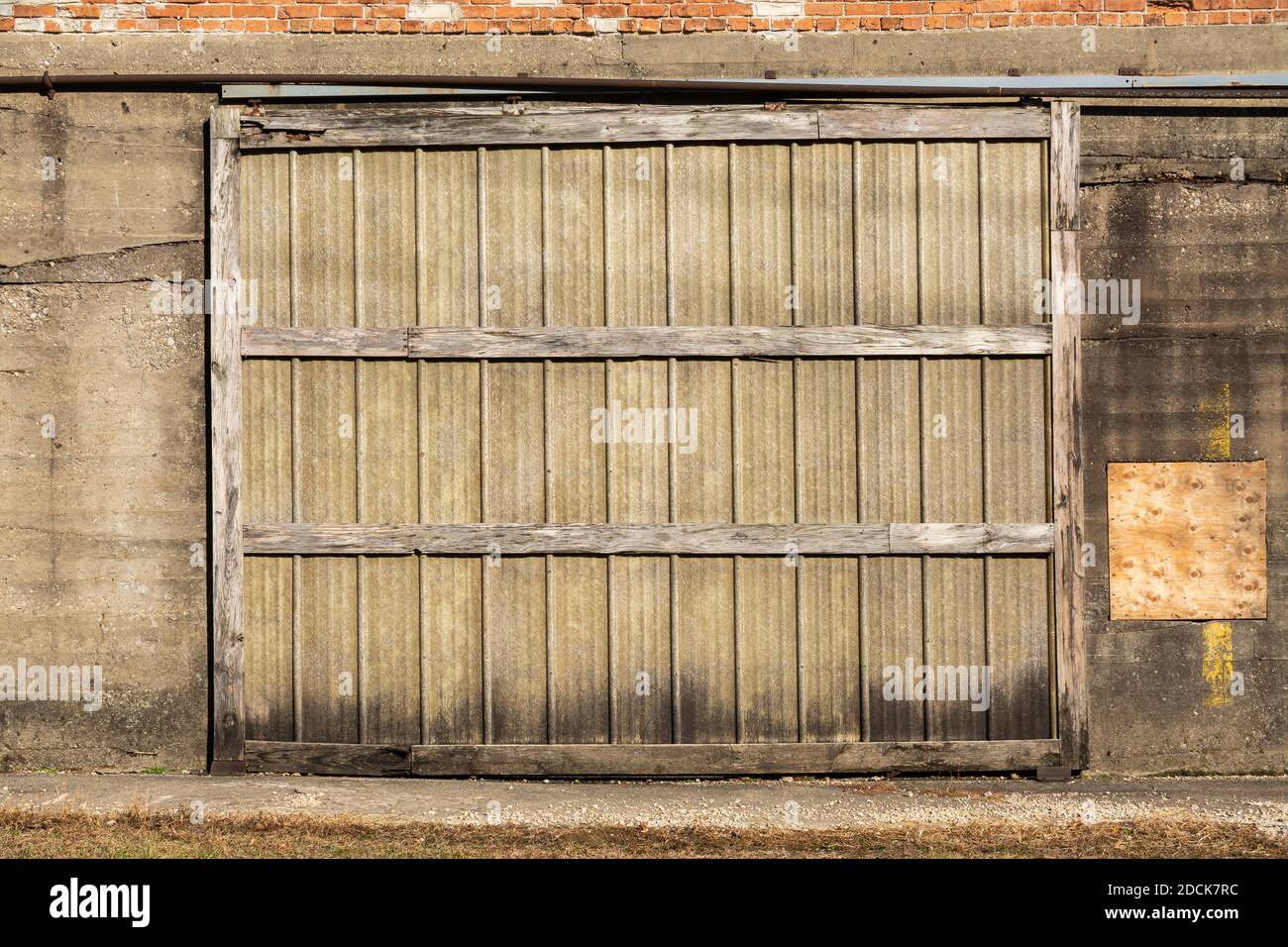 Old abandoned warehouse wall in natural light Stock Photo - Alamy