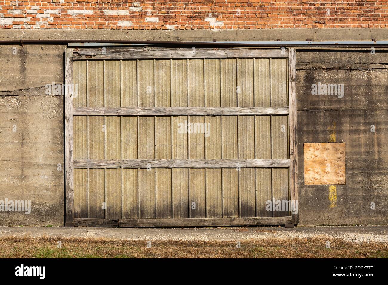 Old abandoned warehouse wall in natural light Stock Photo - Alamy
