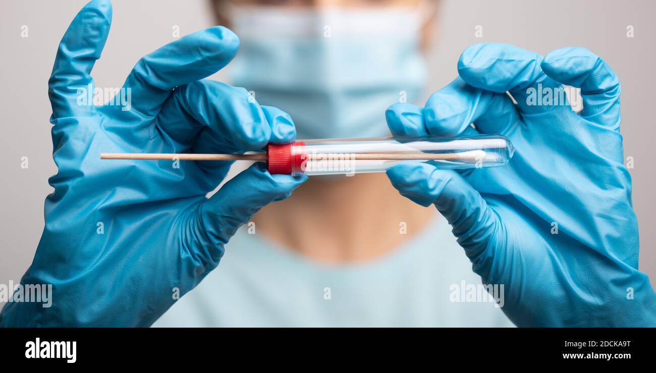 Medical healthcare nurse holding Coronavirus COVID-19 swab test kit ...
