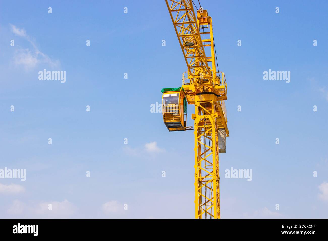 Yellow crane is used in the construction of high buildings for tool of ...
