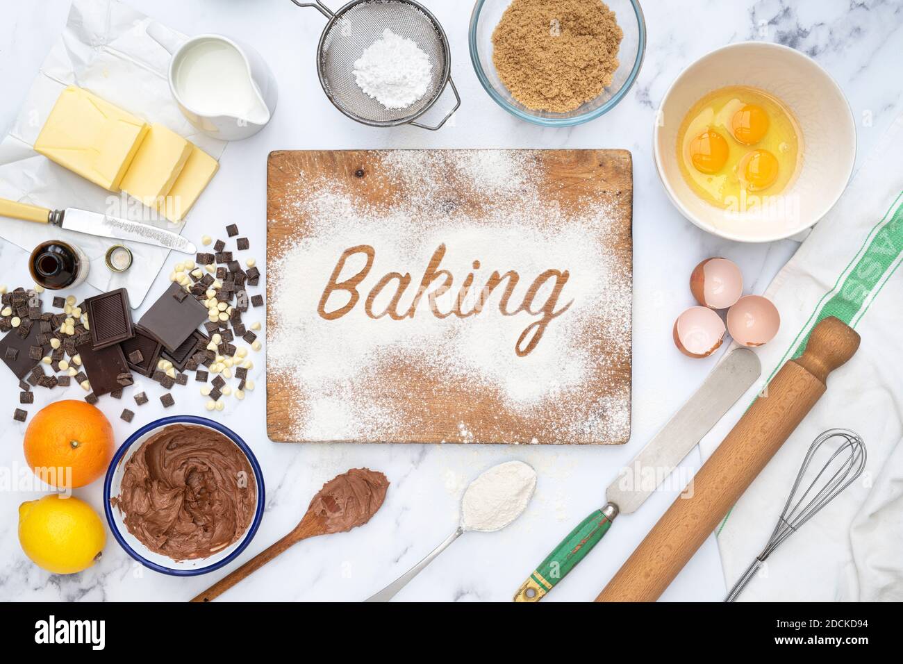 Baking written in flour with ingredients Stock Photo - Alamy