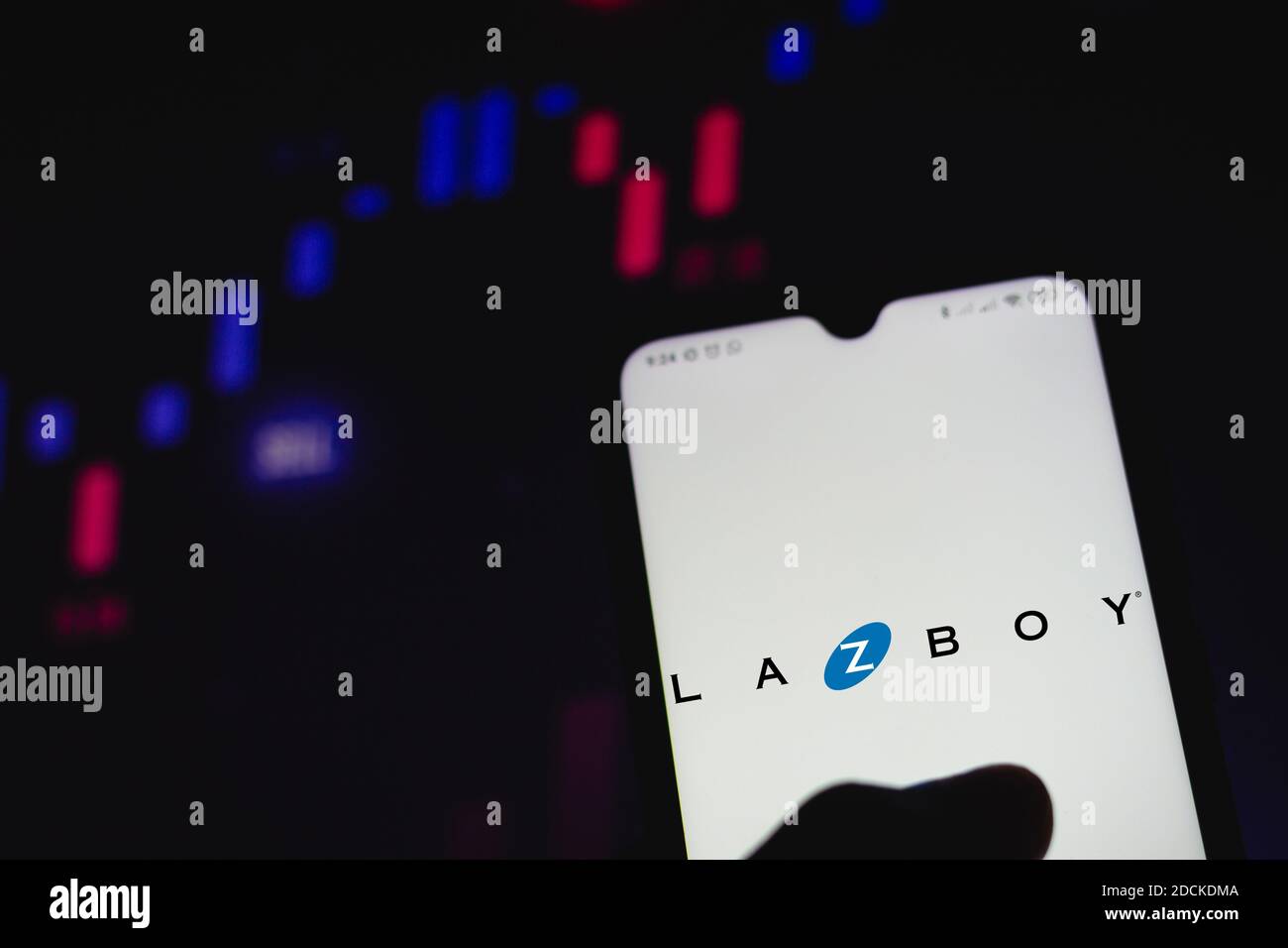 In this photo illustration the La-Z-Boy logo seen displayed on a ...