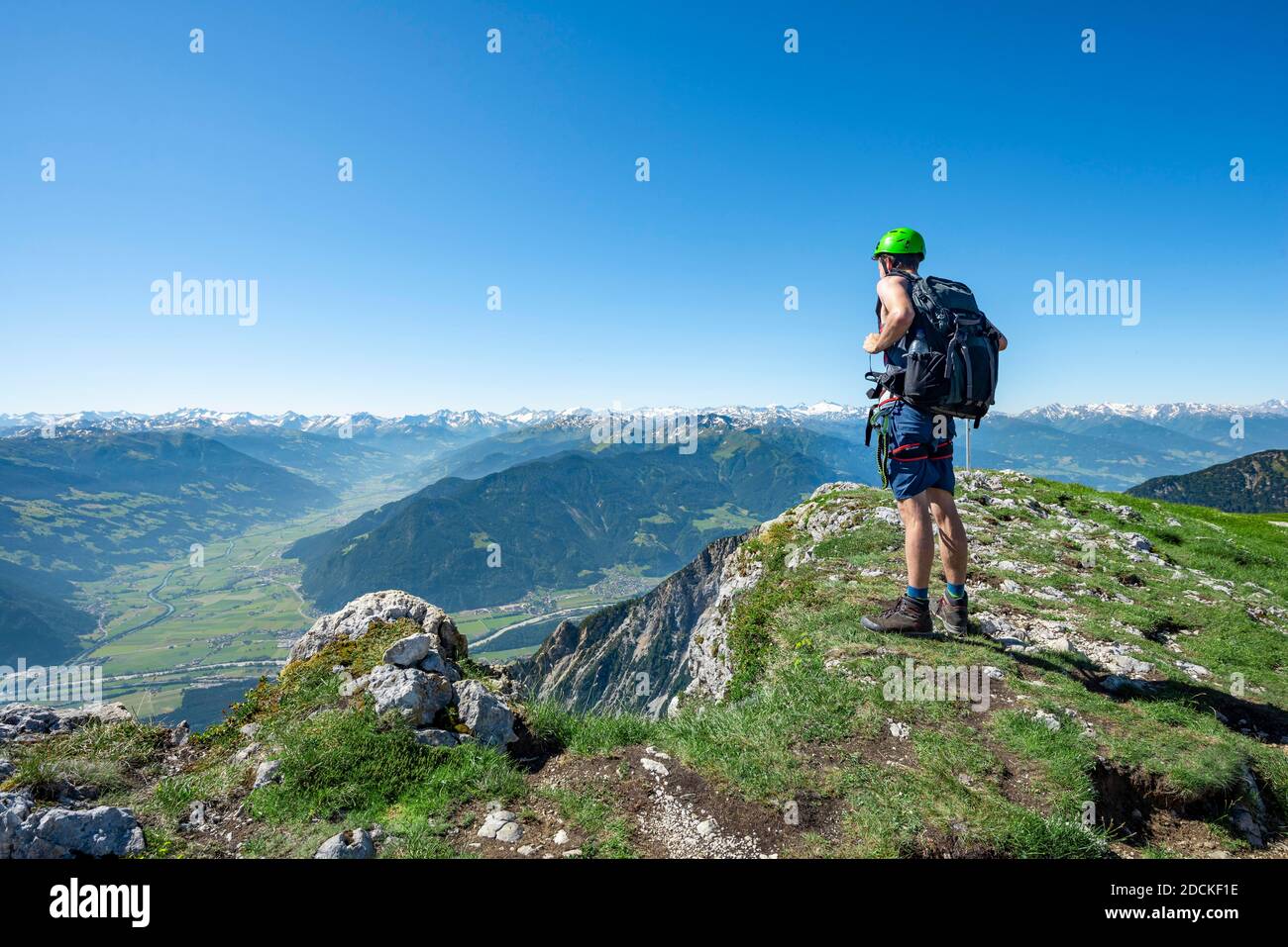 Hiker looks down into the Inn valley, Haidachstellwand peak, 5-summit ...
