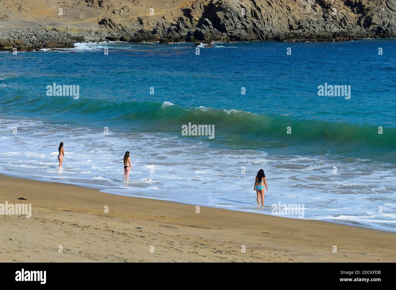 Bathers at the beach of Quebrada de la Huaca, also Puerto Inca, Chala ...