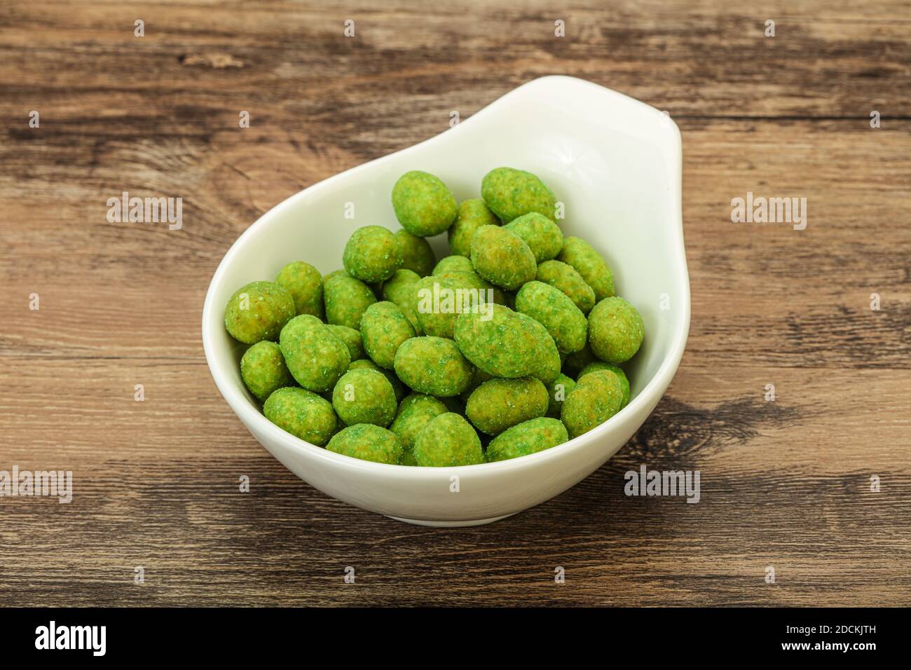 Spicy wasabi peanuts snack in the bowl Stock Photo - Alamy