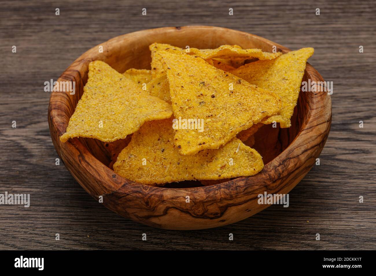 Mexican crunchy corn nachos triangle heap Stock Photo - Alamy