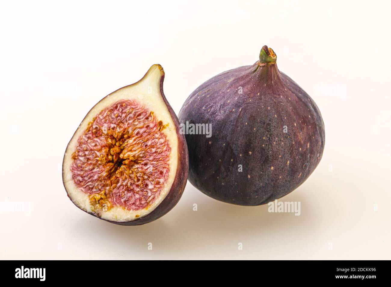 Sweet purple slice of fig fruit Stock Photo - Alamy
