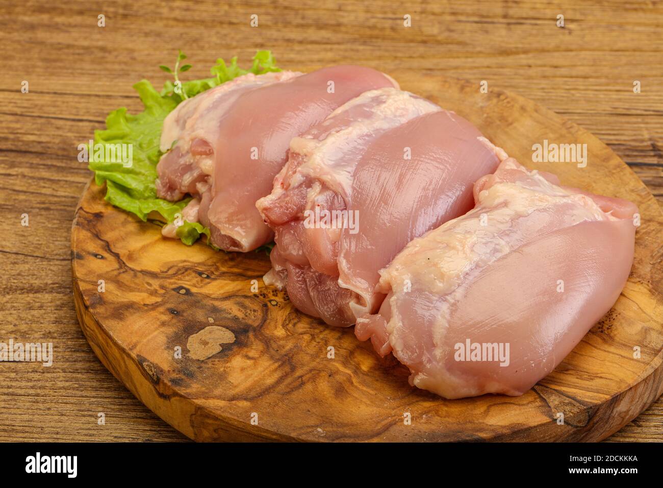 Raw chicken boneless and skinless leg for cooking Stock Photo - Alamy