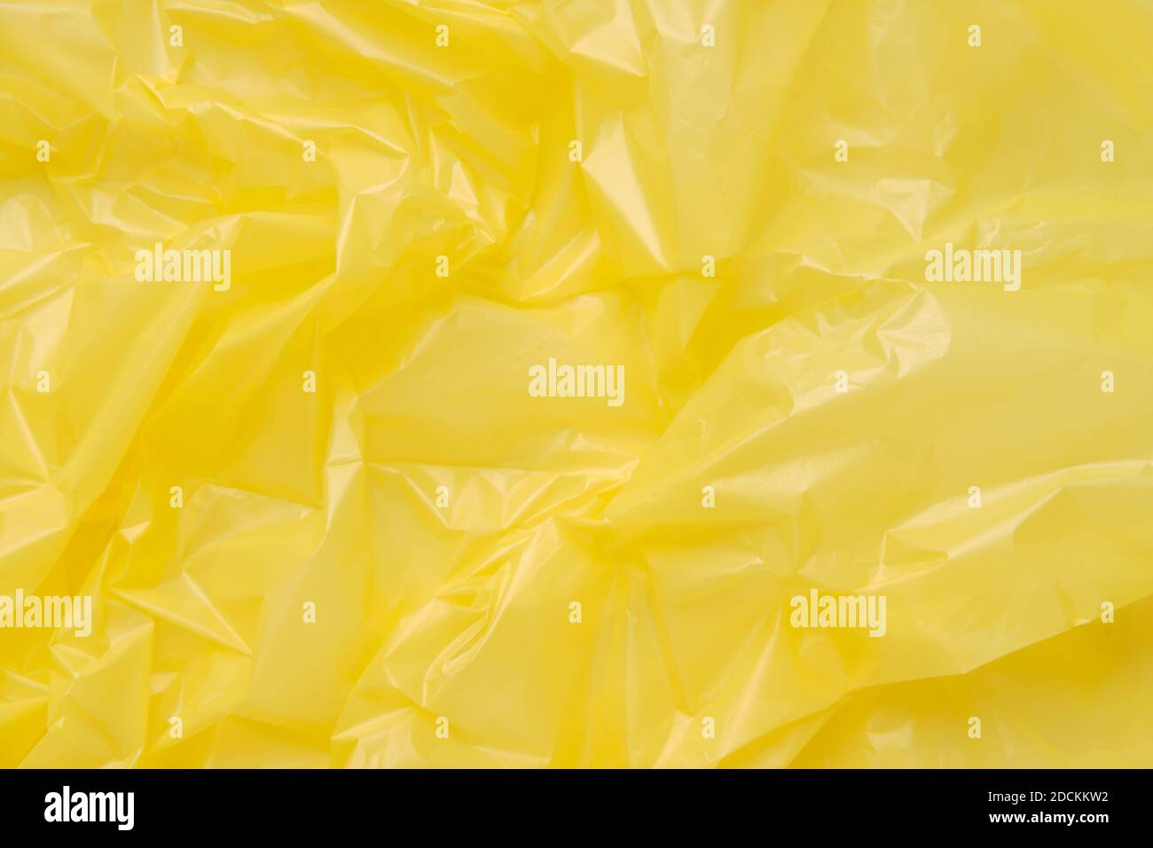 Close up Texture of a Yellow Plastic garbage Bag. Yellow Polyethylene ...