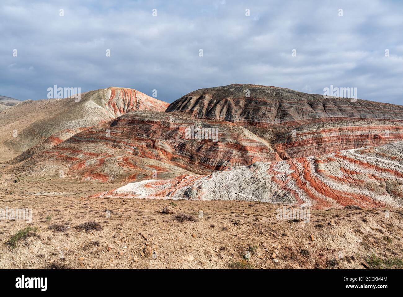 Striped red mountains landscape, beauty of nature Stock Photo - Alamy