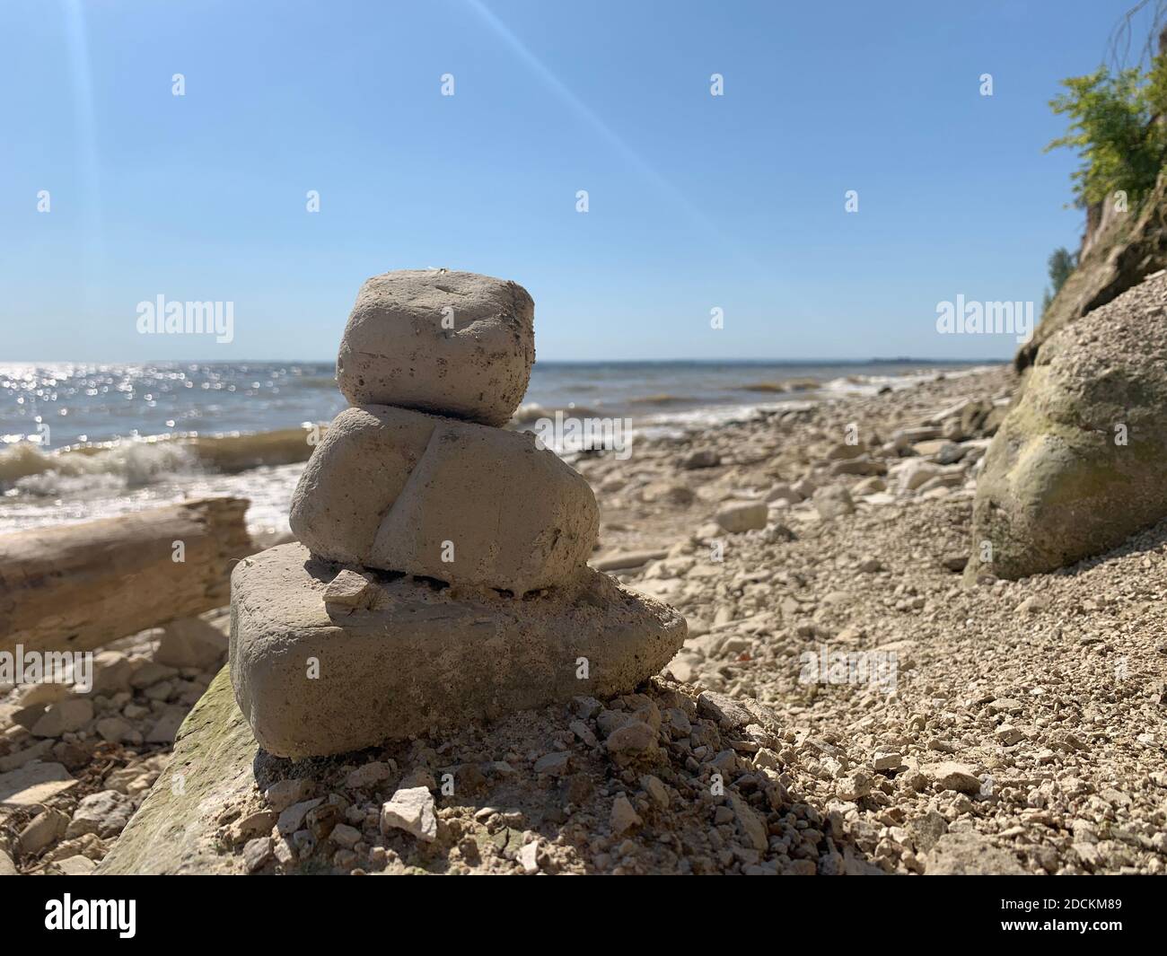 Stones pile on the beach. Copy space Stock Photo - Alamy