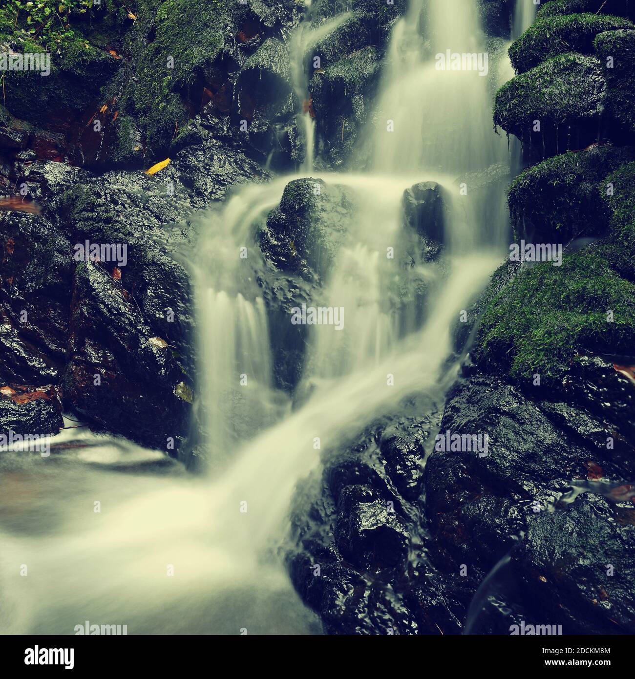 Nature - beautiful small waterfall on the creek. Natural colorful ...