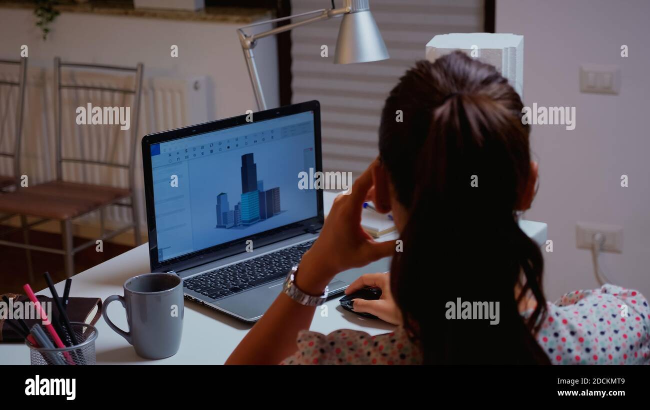 Over the shoulder shot of engineer working with cad software on desktop ...