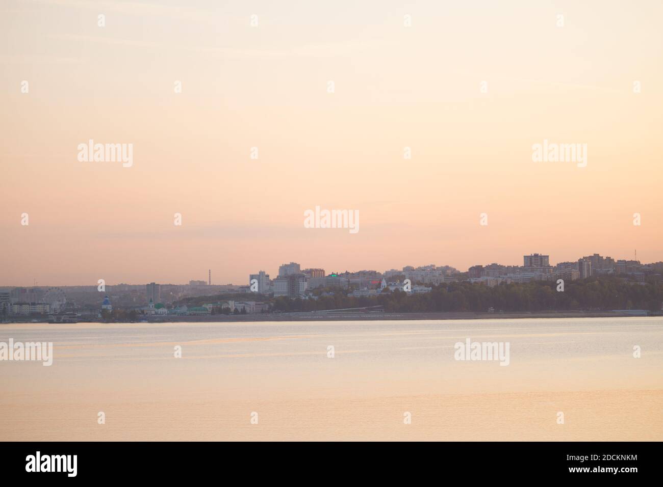 View on a small city by the river Stock Photo - Alamy