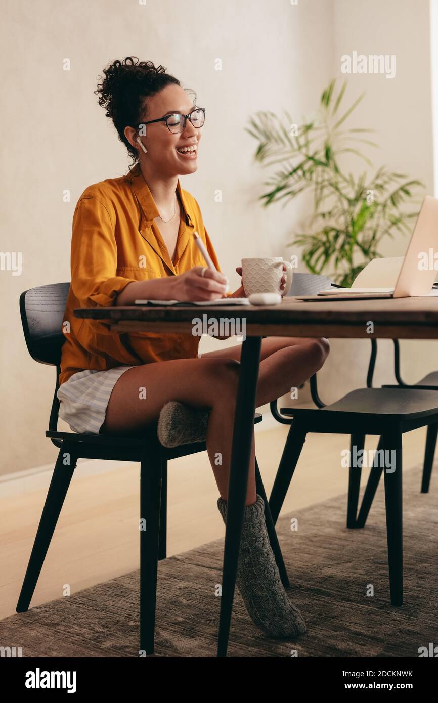 Woman having a video call meeting at home. businesswoman in meeting by ...