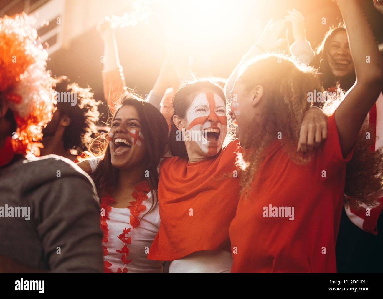 English soccer fans watching the match from the stadium and celebrating ...