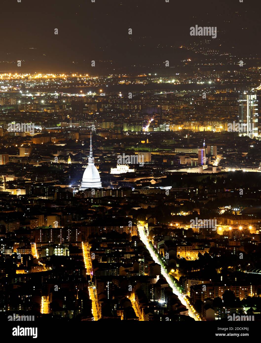 lights of the city of turin in Italy seen from above and the Dome of ...