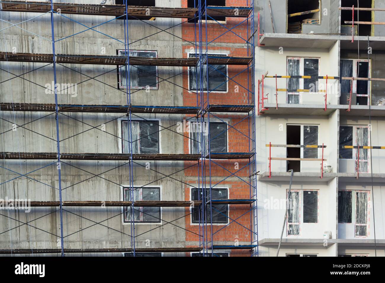 Scaffolding covering apartment building hi-res stock photography and ...