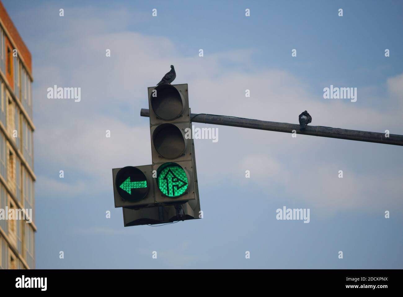 Green color on the traffic light Stock Photo - Alamy