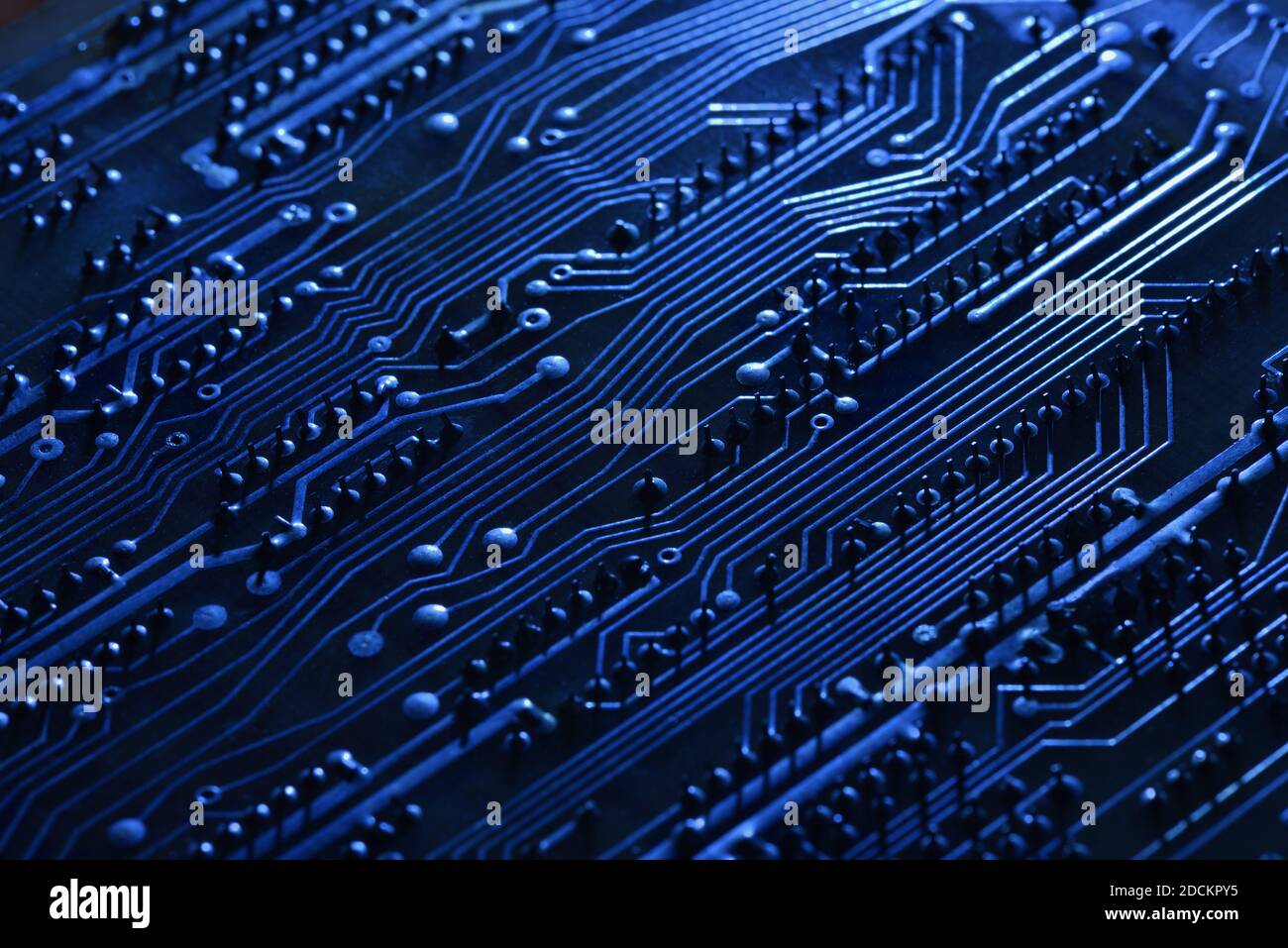 Electronic circuit Board of blue color as the technology background ...