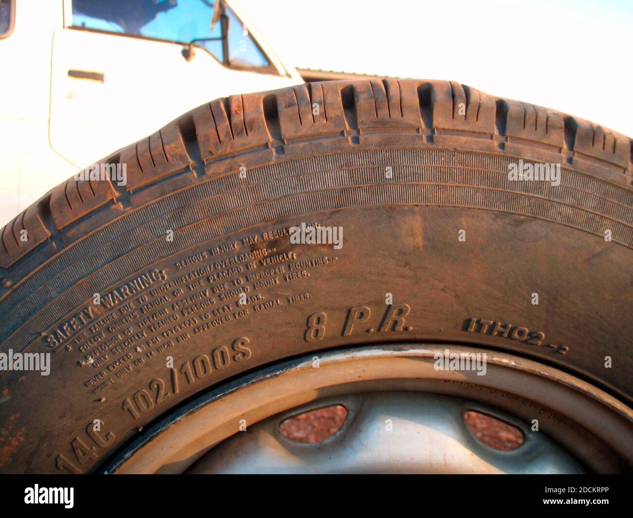 car tire and tyre tread with readable safety warning on it Stock Photo ...