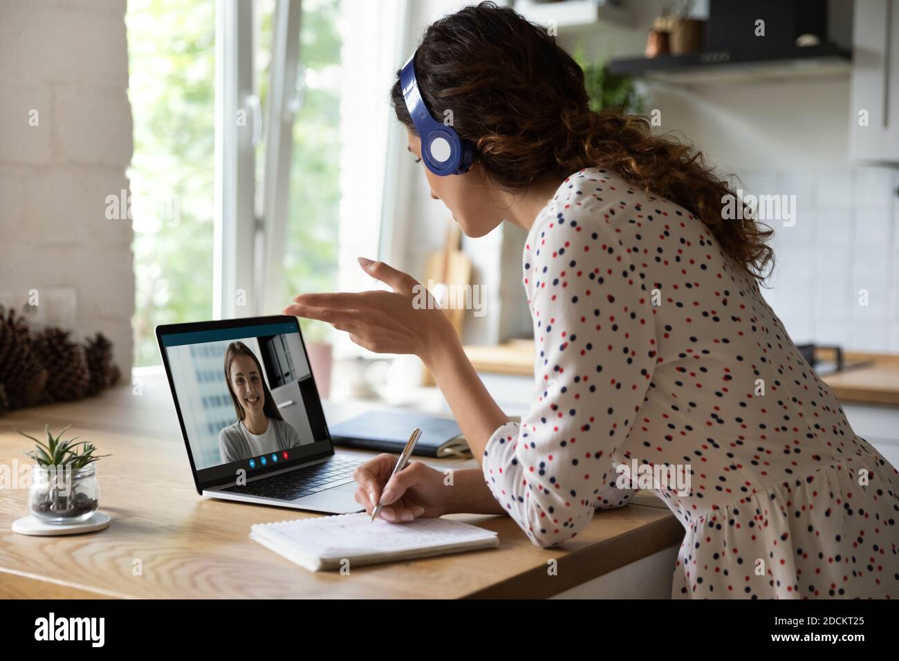Woman employee have video call with colleague at home Stock Photo - Alamy