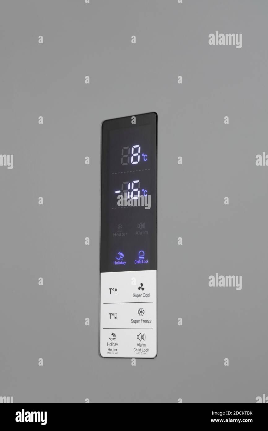 Details of the digital screen of the gray refrigerator Stock Photo - Alamy