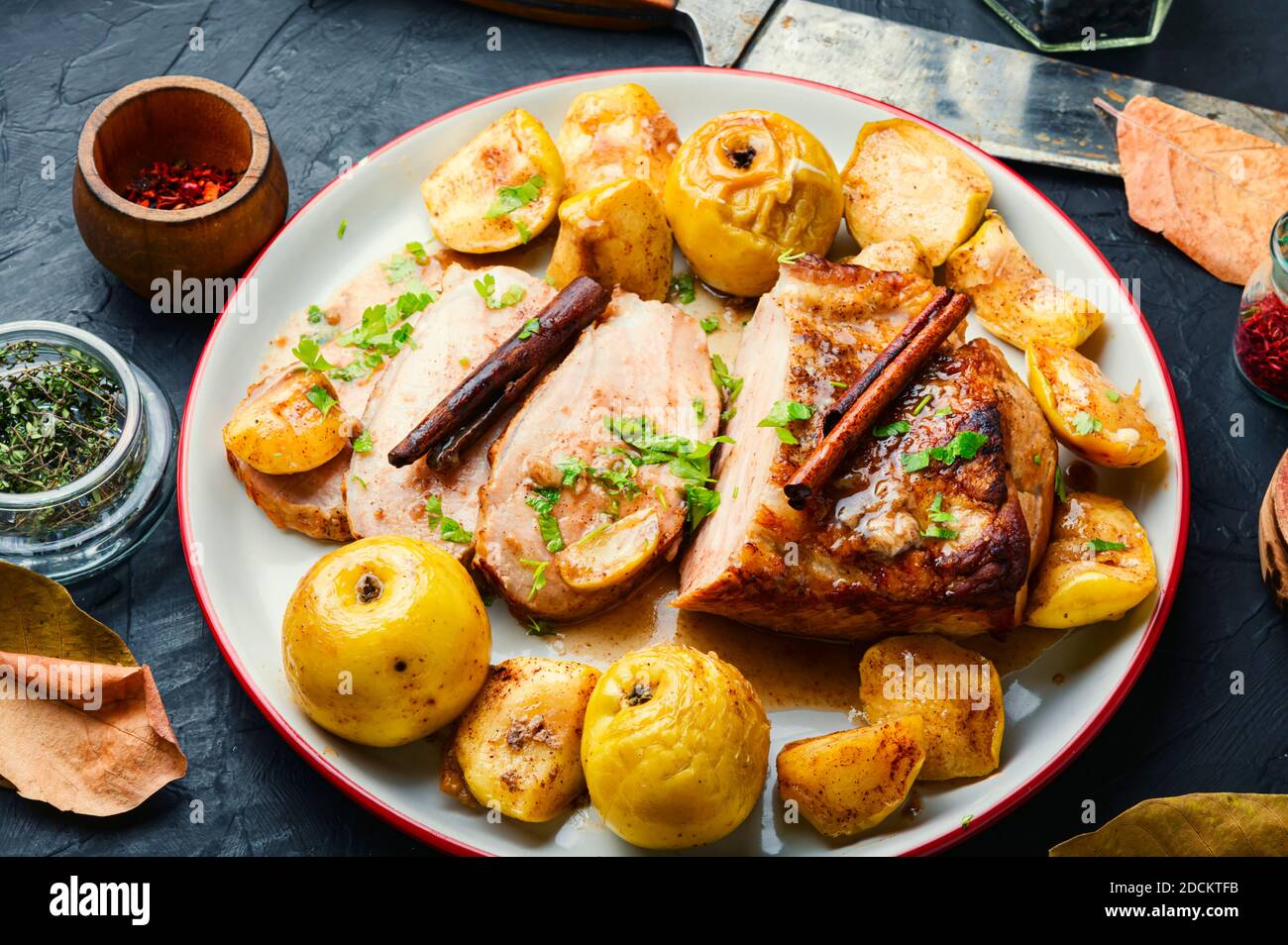 Baked meat with apples.Fried pork loin stuffed with apple Stock Photo ...